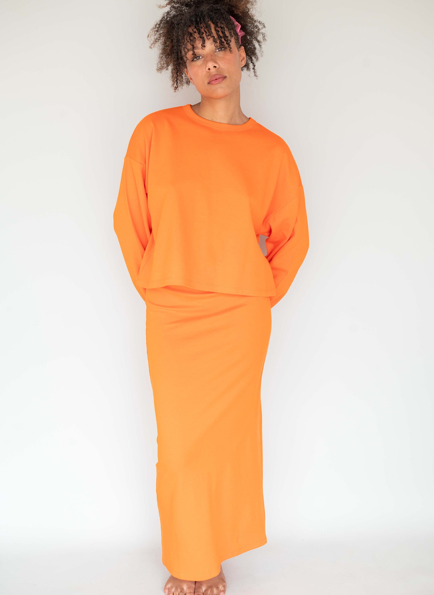 We Are Jolies Jupes mi-longues Jupe longue en maille coton uni Orange ...